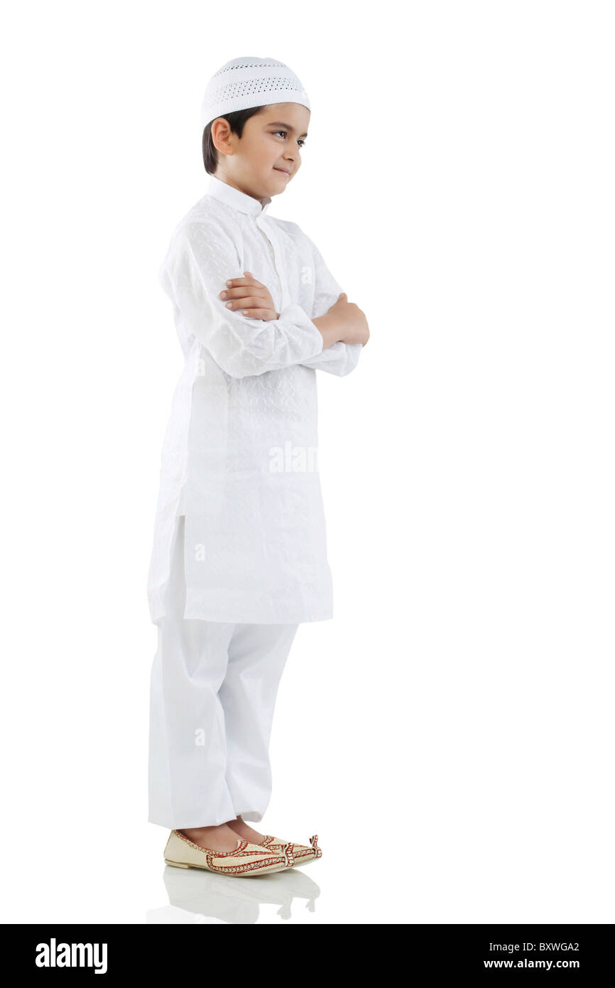 Muslim boy standing Stock Photo - Alamy