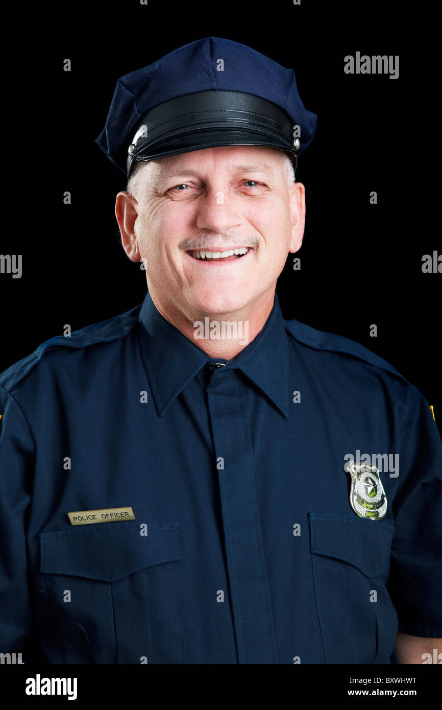 Portrait of friendly, smiling police officer on black background Stock ...