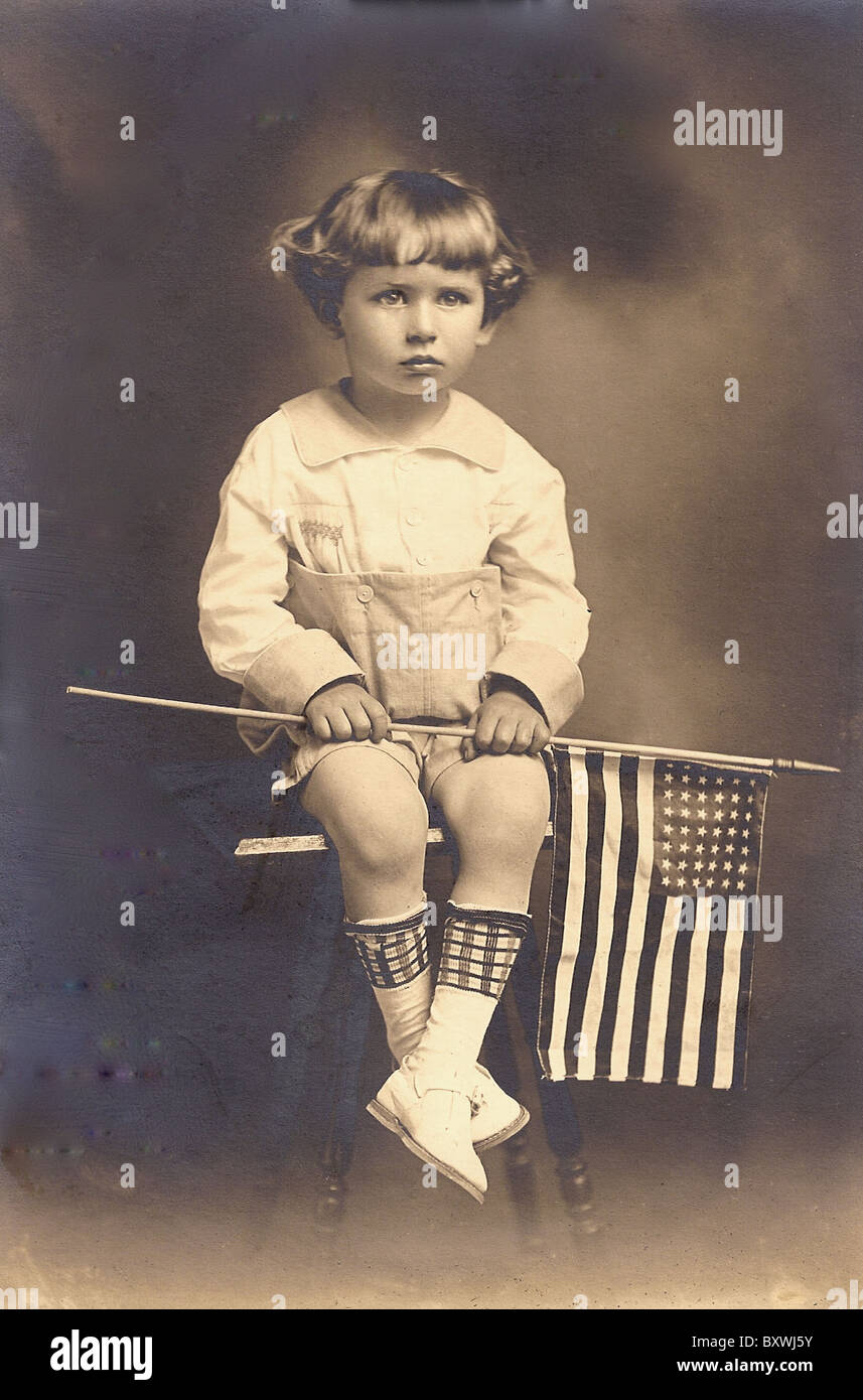 Boy holds american flag hi-res stock photography and images - Alamy