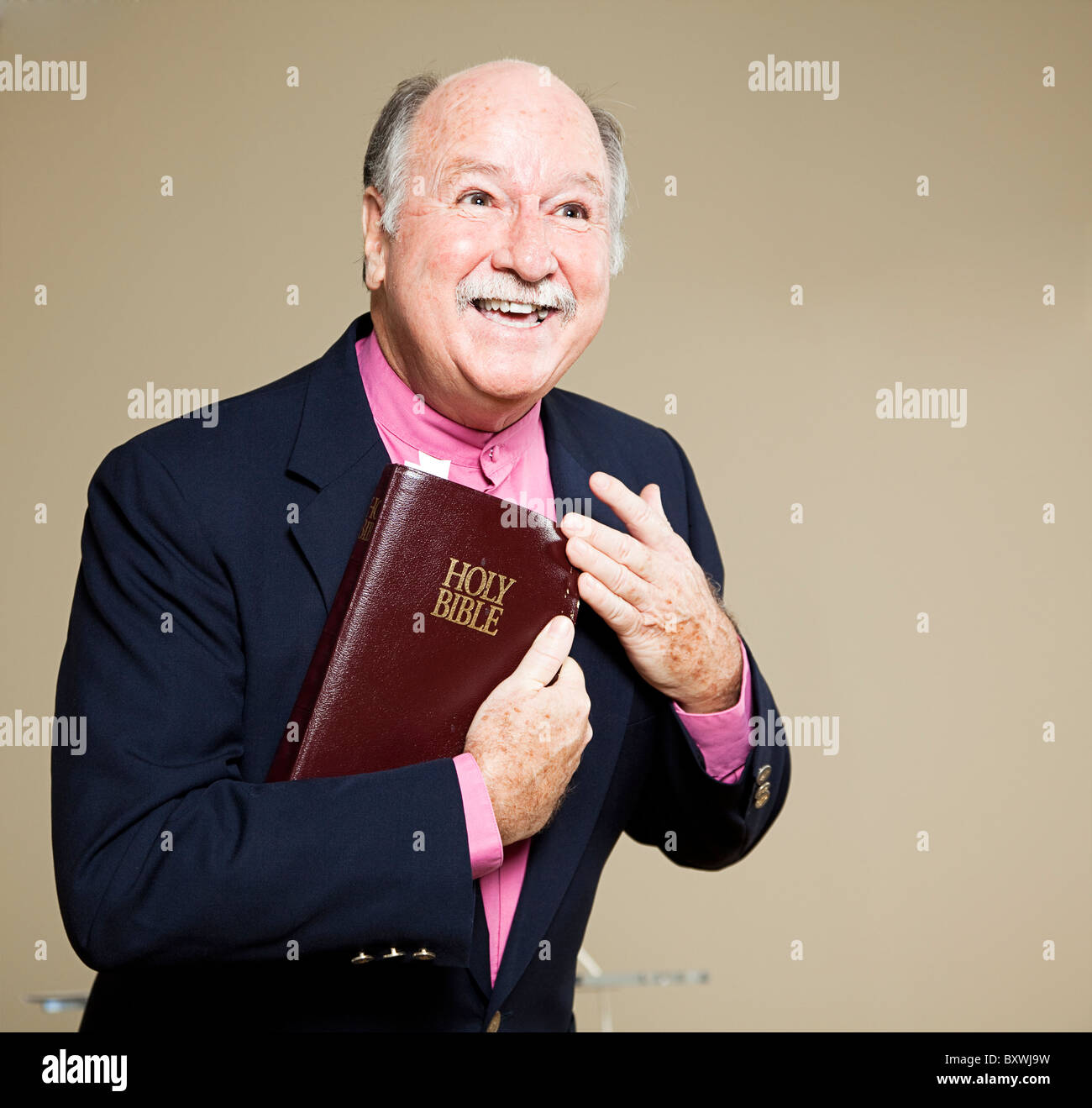 Smiling preacher bible in church hi-res stock photography and images ...