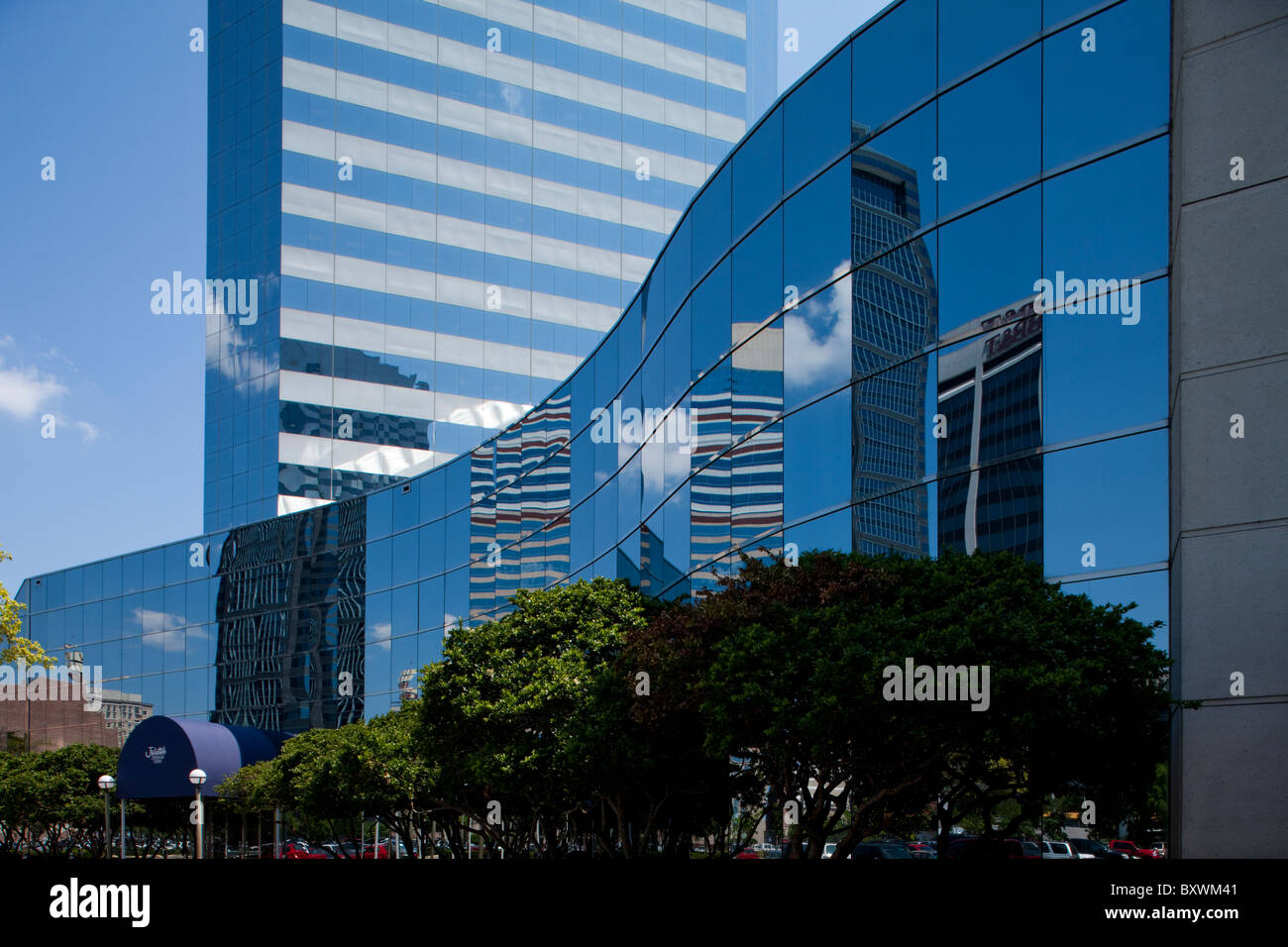 USA, Florida, Jacksonville, Surrounding buildings and blue sky ...