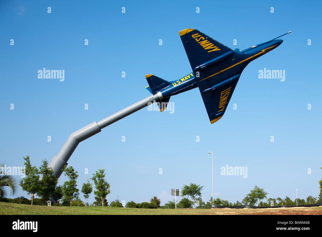 USA, Florida, Pensacola, US Navy Blue Angels F-22 jet on pedestal along ...