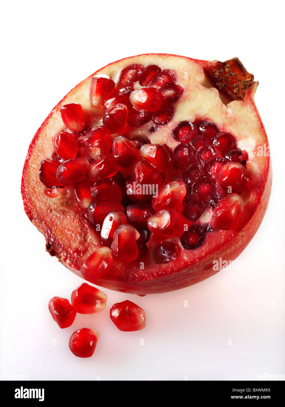 pomegranate cut in half Stock Photo - Alamy