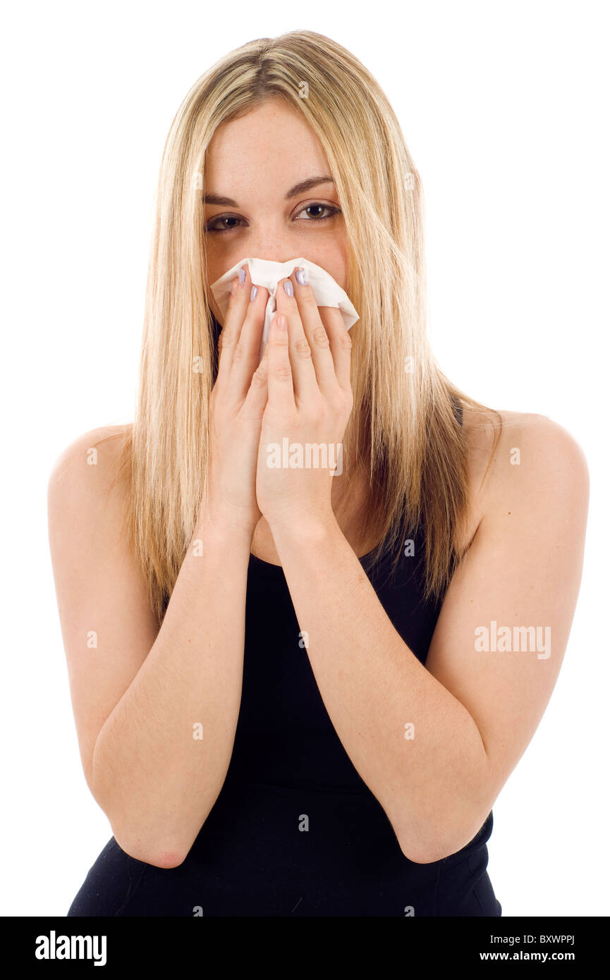 Young female having a cold isolated over white background Stock Photo ...