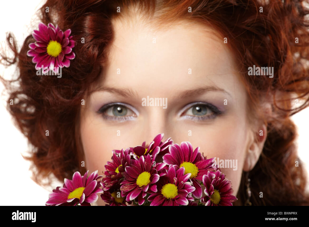 Portrait of a happy women with flowers Stock Photo - Alamy