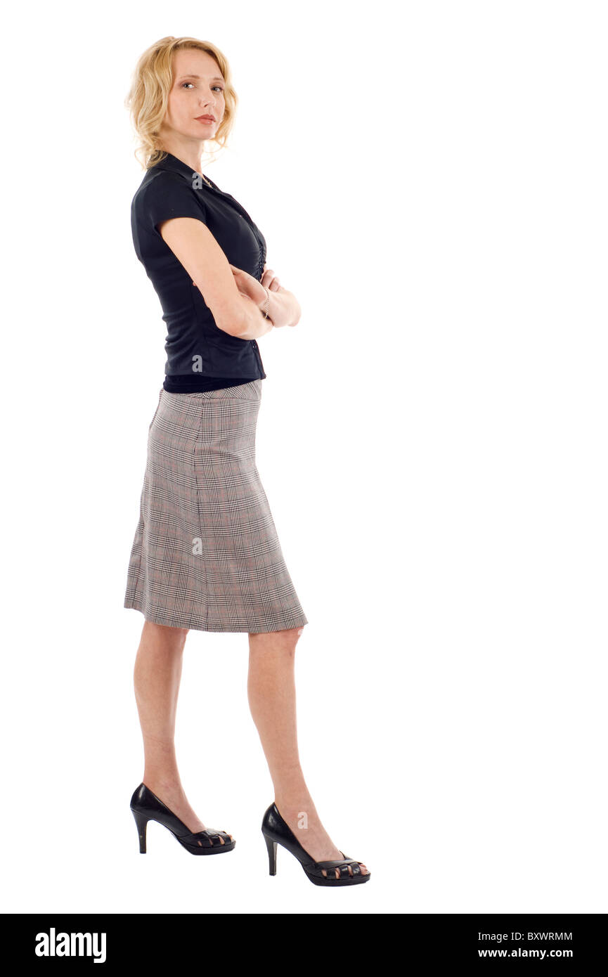Confident business woman standing - isolated over a white background ...