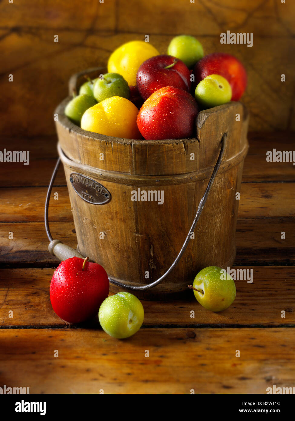 Mixed red, yellow and green plums Stock Photo - Alamy
