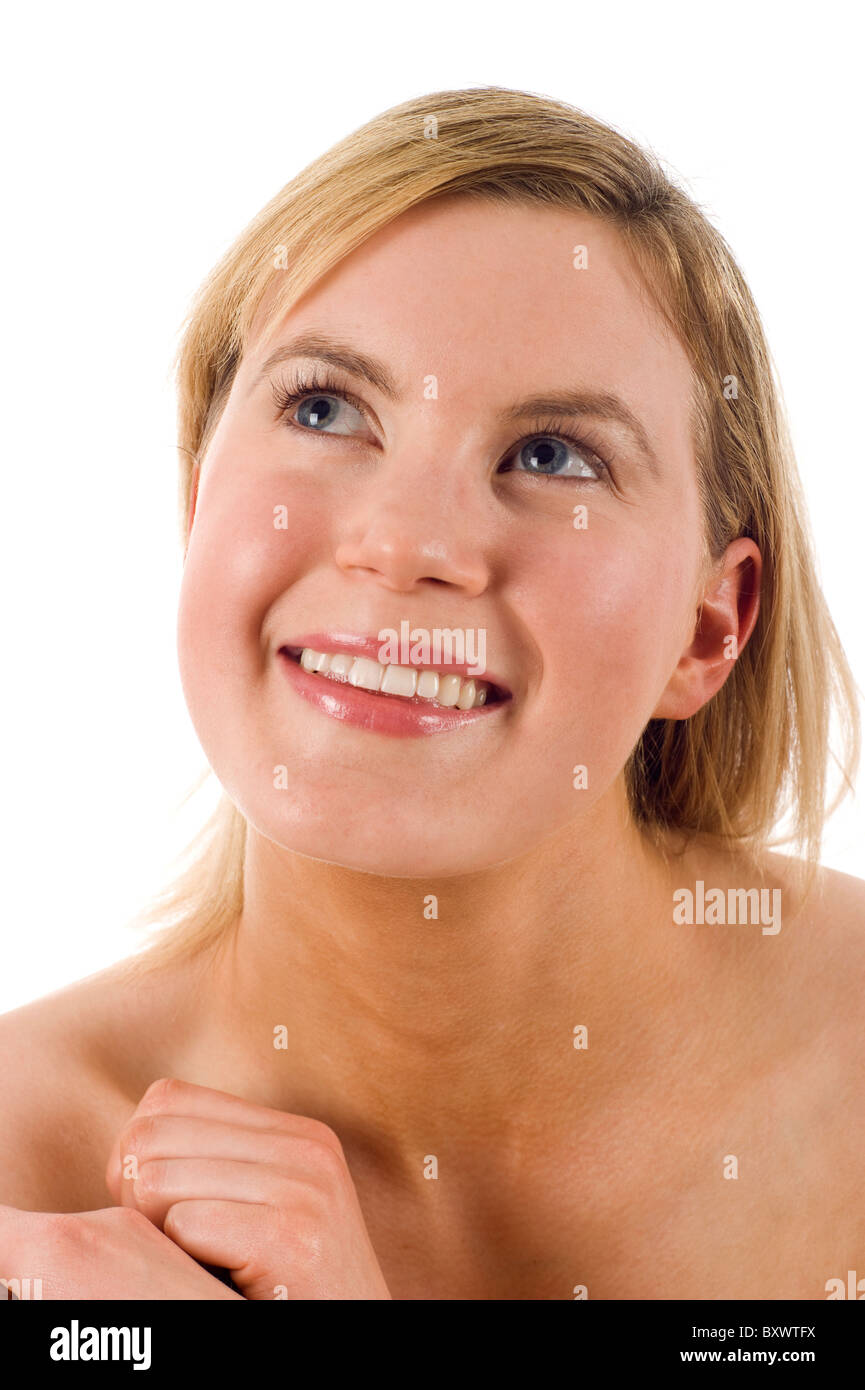 Beautiful young smiling woman looking up isolated over white Stock ...