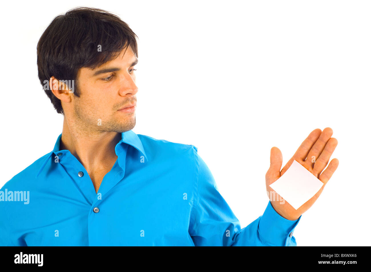Business man with a post-it note on his hand, isolated over white Stock ...