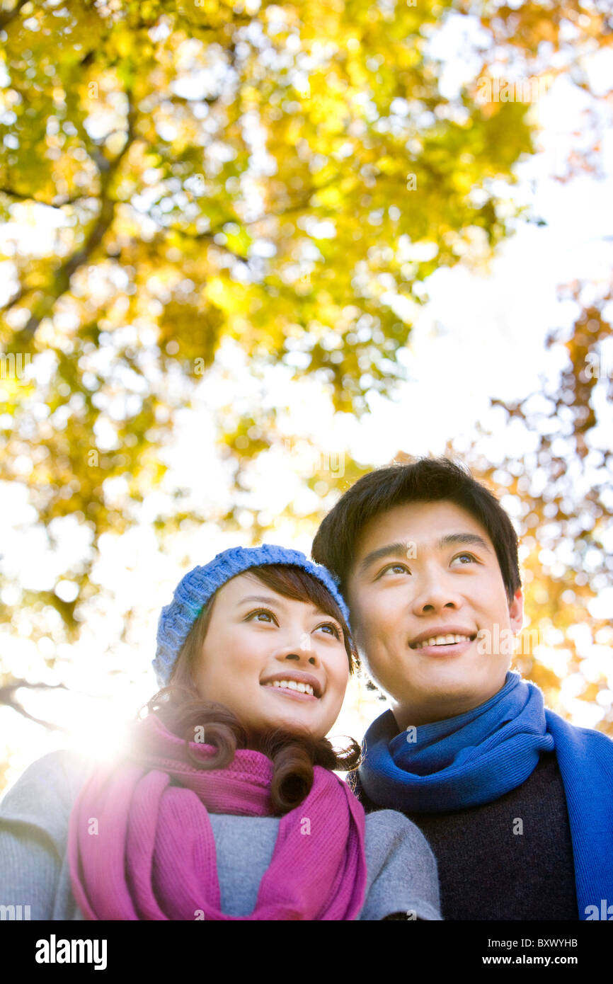 Young Couple Look into the Distance Stock Photo - Alamy