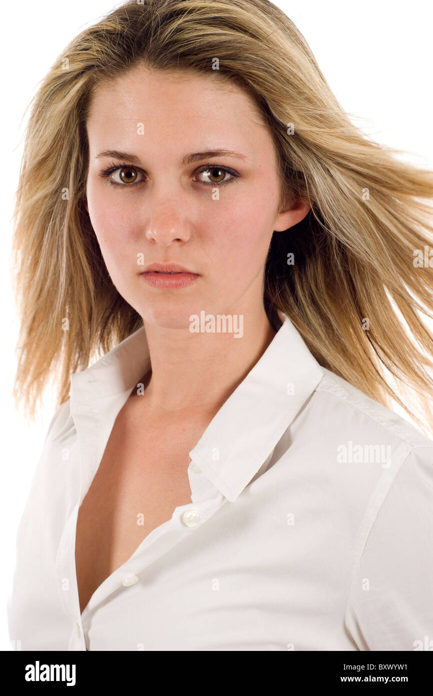 Close up portrait of a young beautiful female model isolated over a ...