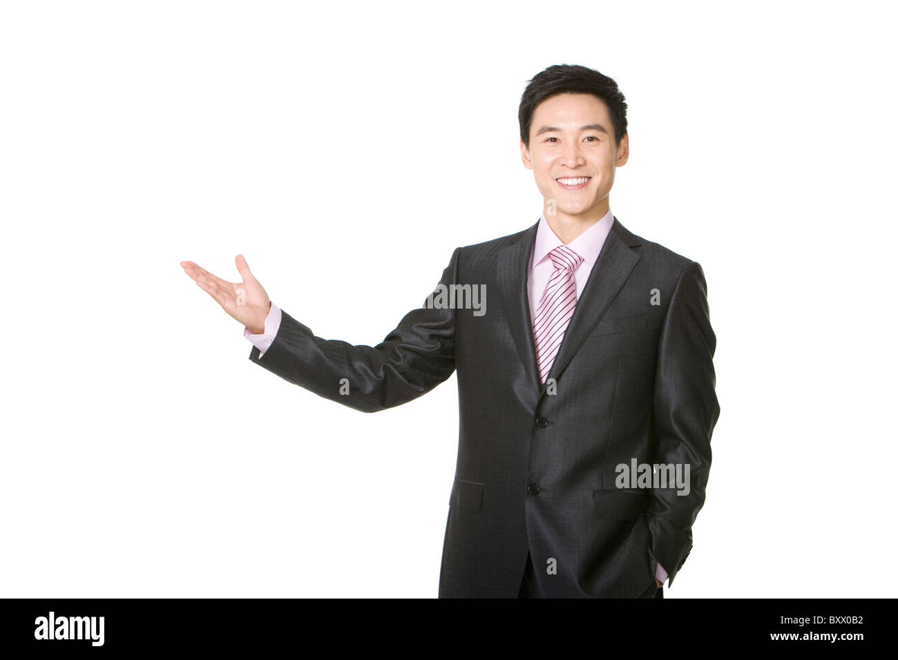 Businessman using hand to show Stock Photo - Alamy