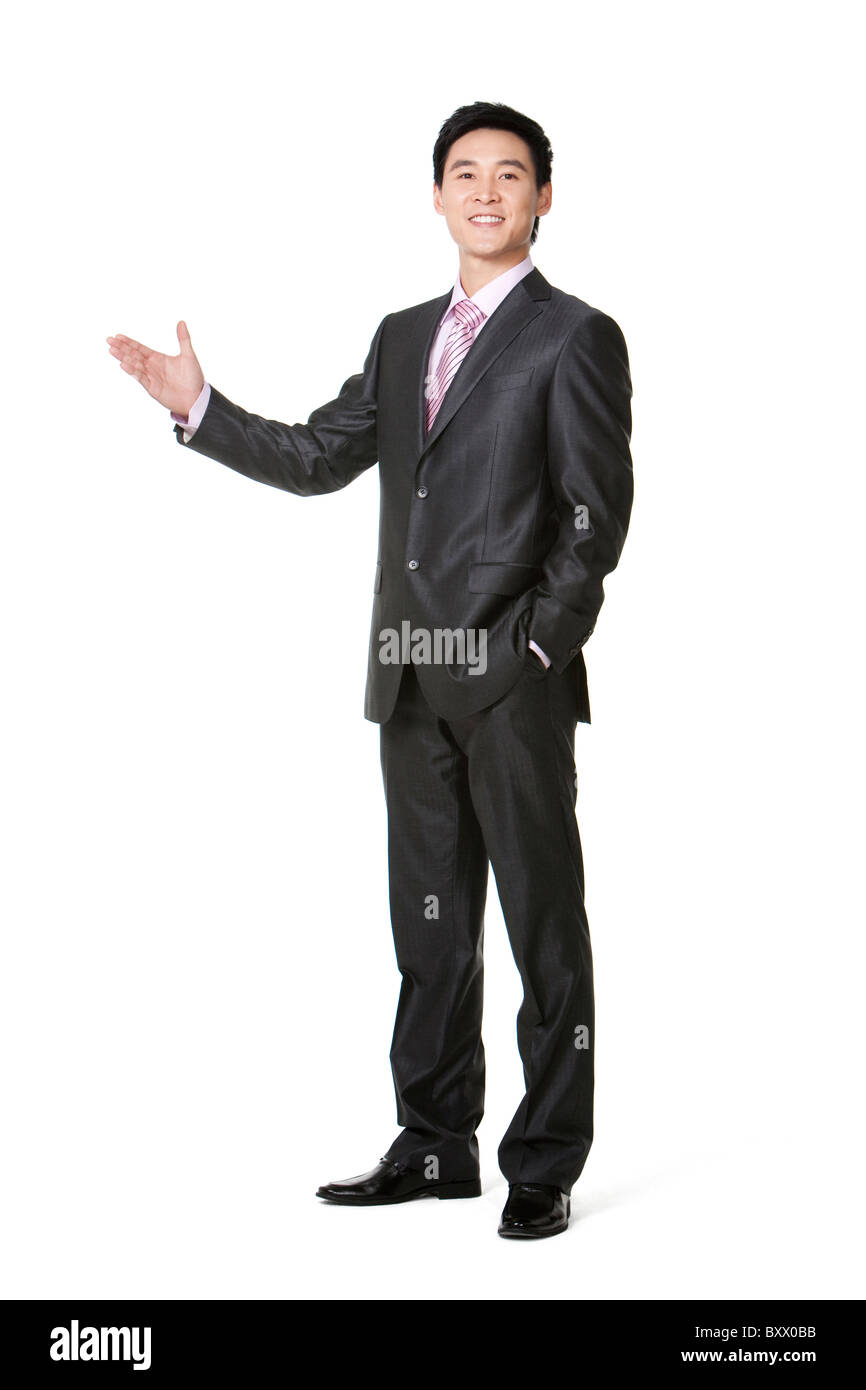 Businessman using hand to show Stock Photo - Alamy