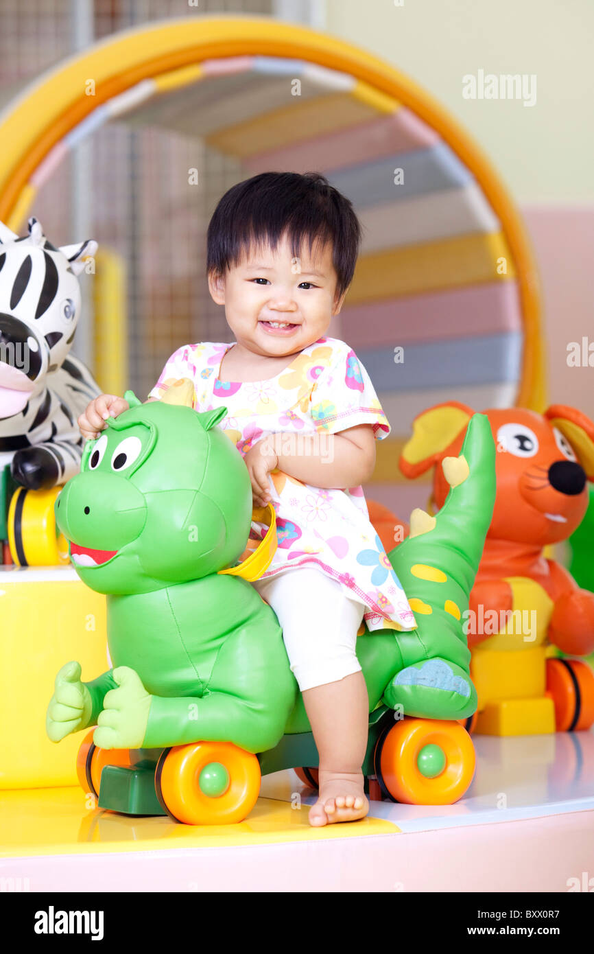 Baby Girl Playing Stock Photo - Alamy