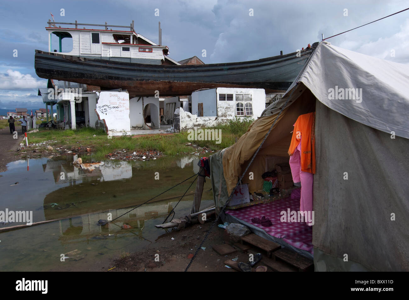 Tsunami leaves boat high and dry 10 months after tsunami Stock Photo ...