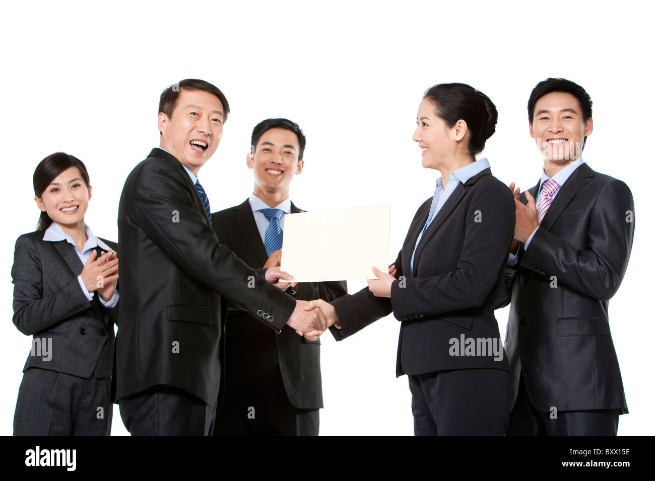 Business partners completing a deal Stock Photo - Alamy