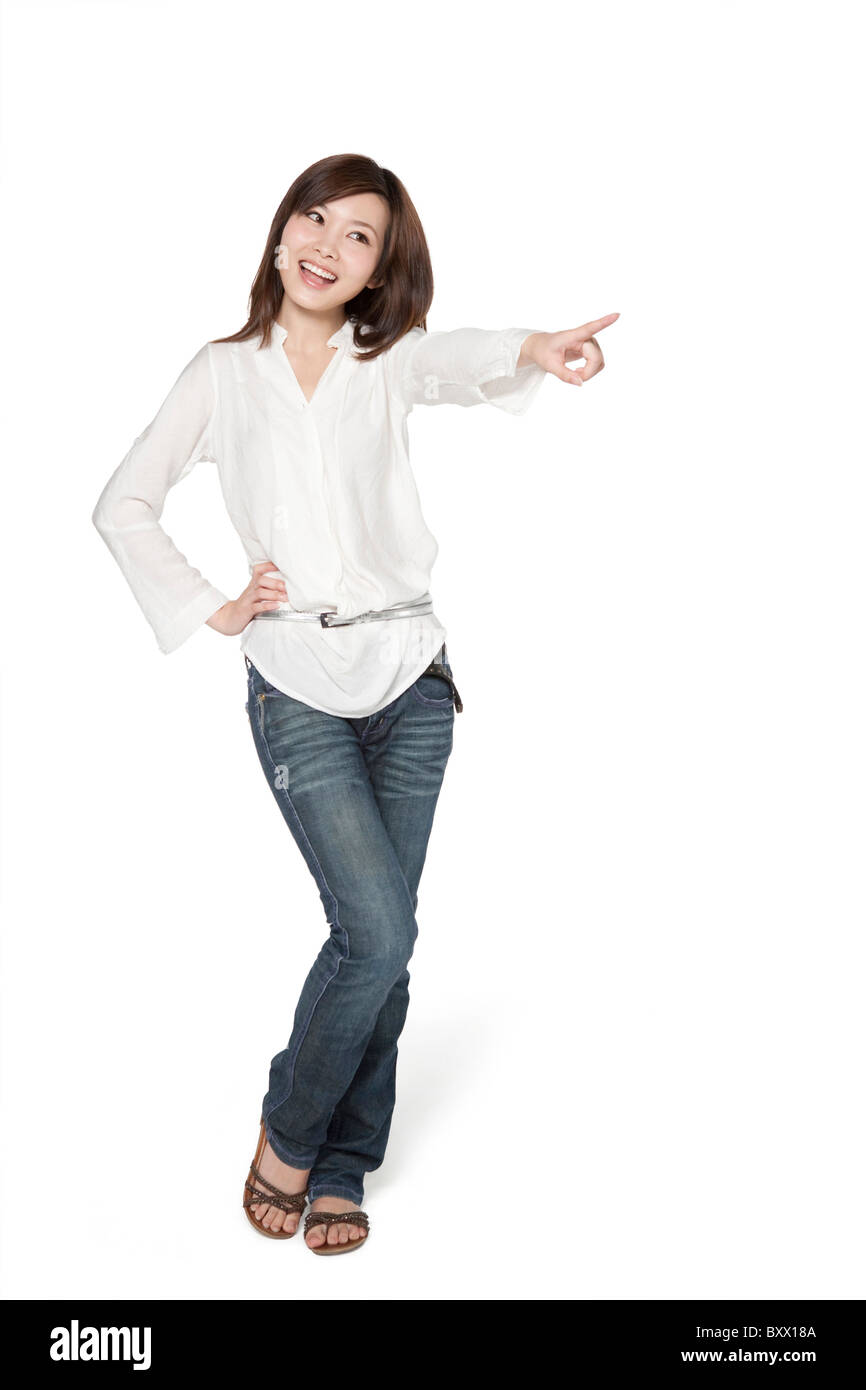 Portrait of Young Woman Pointing Stock Photo - Alamy