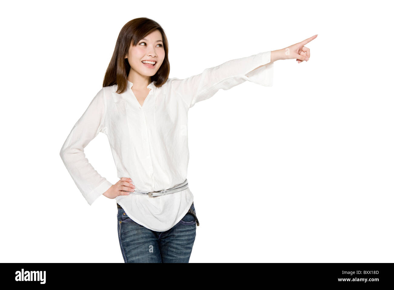 Portrait of Young Woman Pointing Stock Photo - Alamy