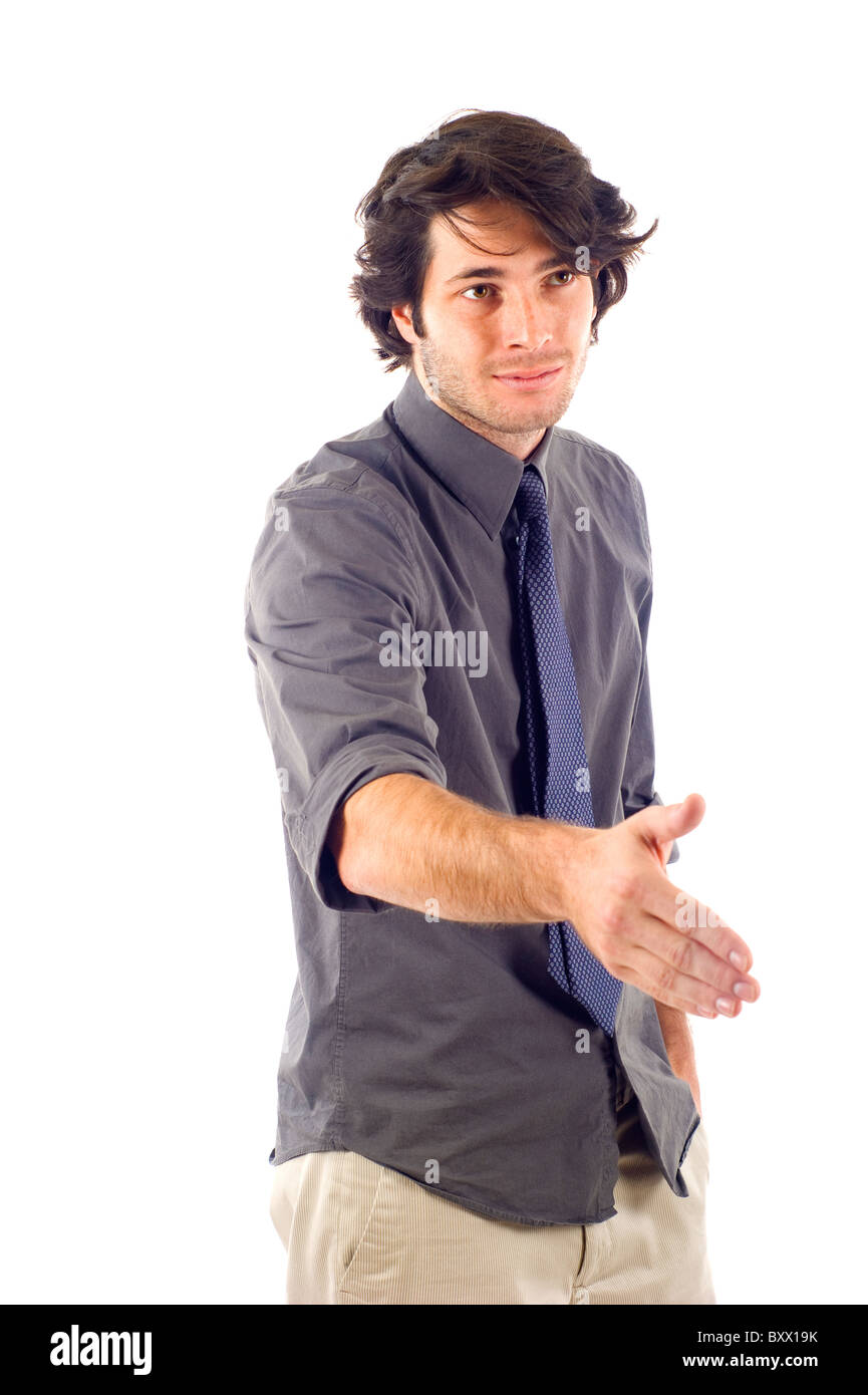 Businessman saying welcome, giving a handshake Stock Photo - Alamy