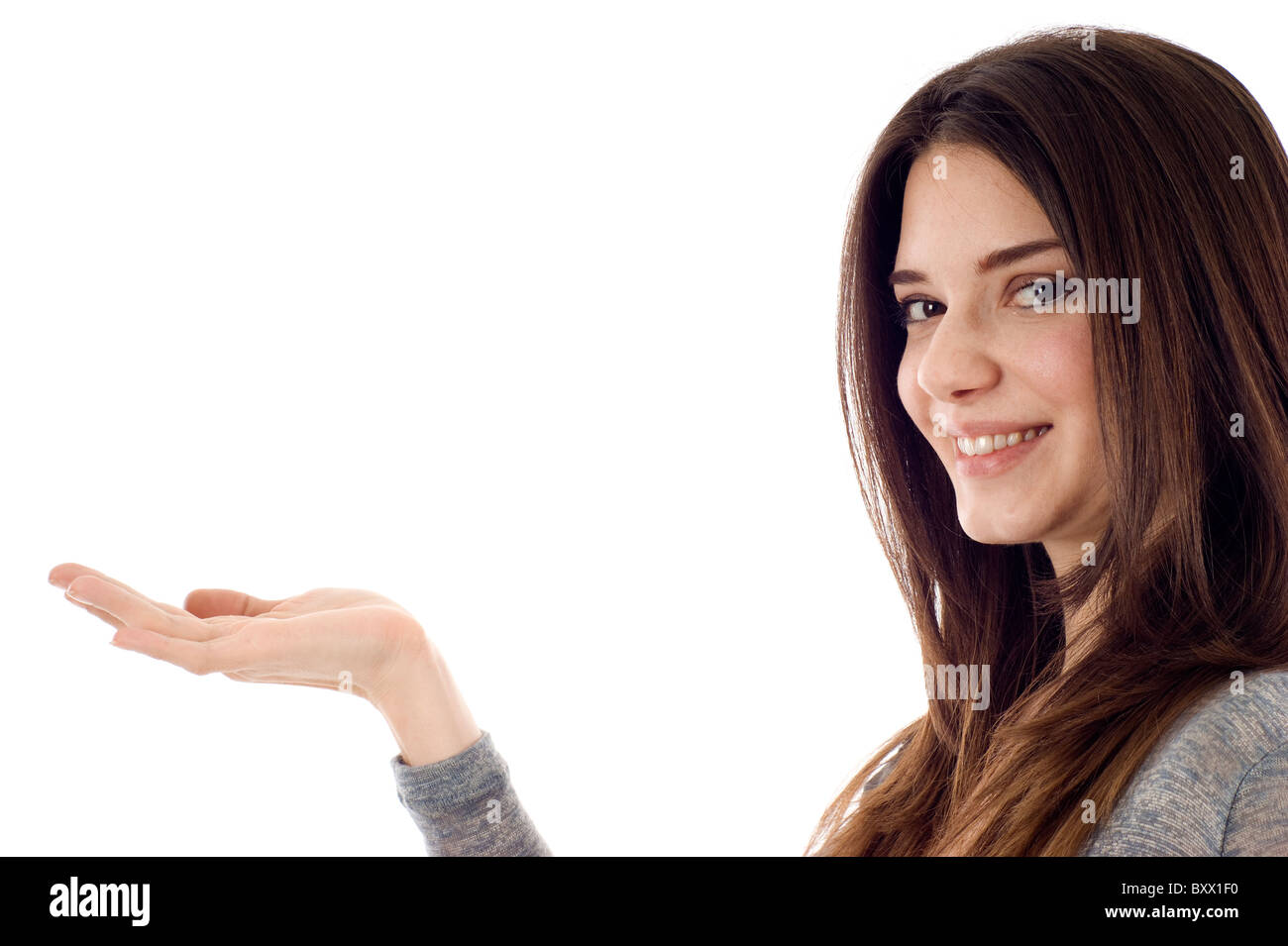 Beautiful woman presenting your very exciting product. Isolated on ...