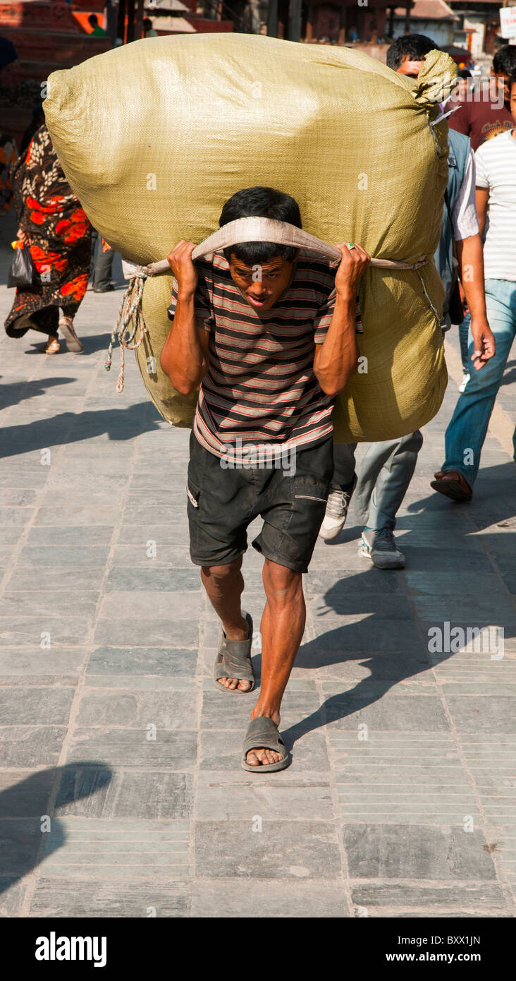 Porter carry heavy load hi-res stock photography and images - Alamy