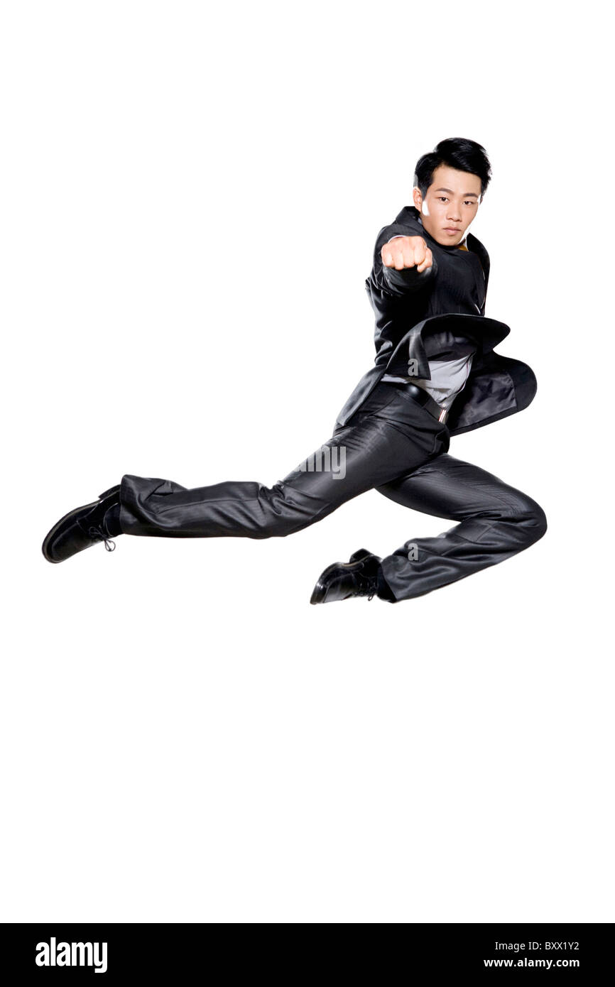 Man jumping and punching in air hi-res stock photography and images - Alamy