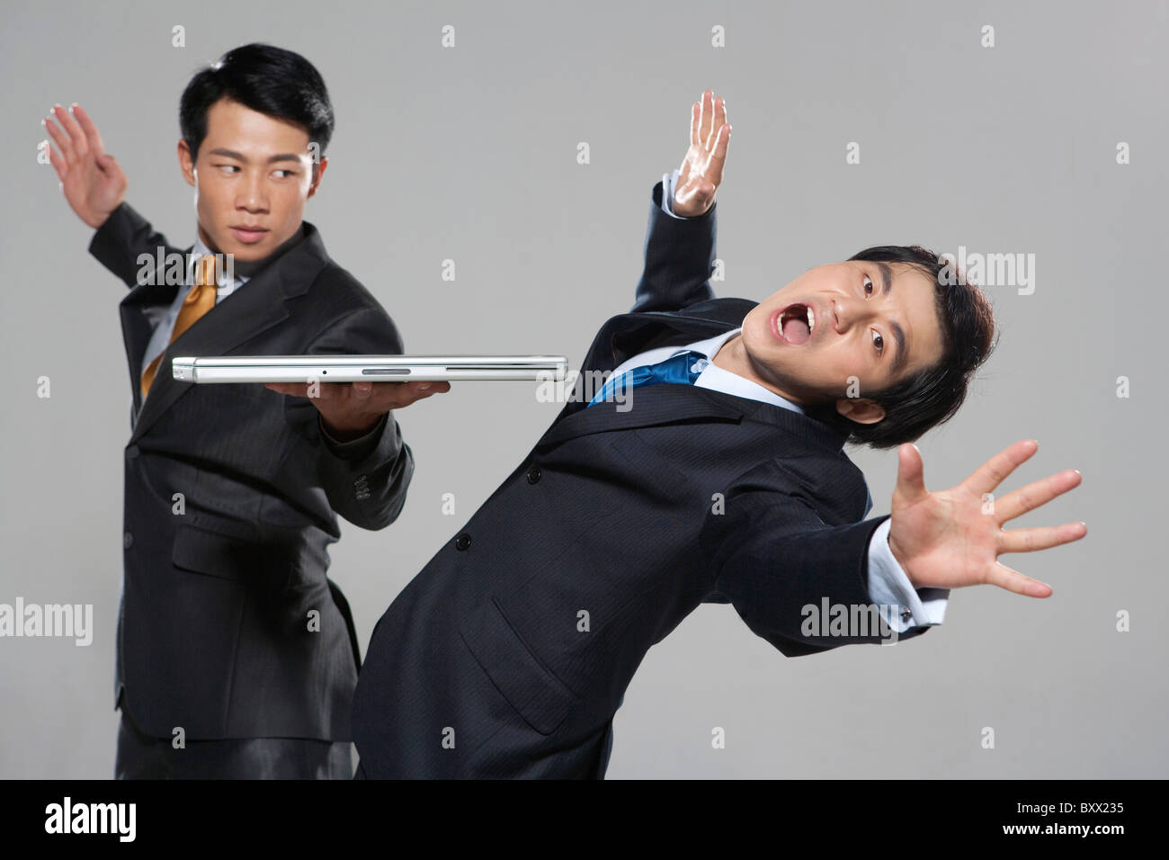Two businessmen fighting hi-res stock photography and images - Alamy