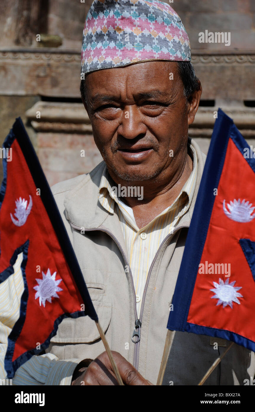 NEPAL MAN WITH FLAGS Stock Photo - Alamy