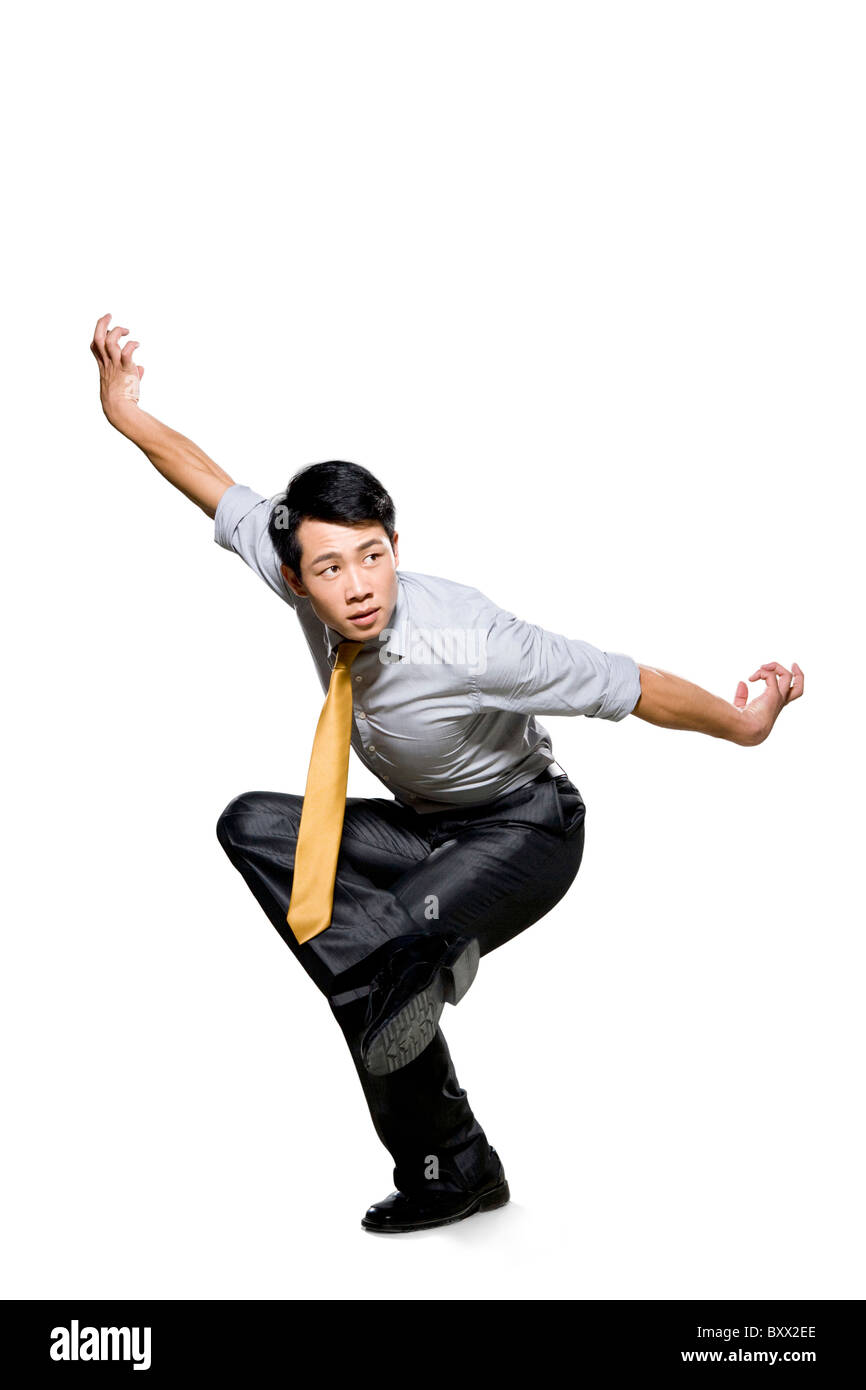 Crouching in one leg Cut Out Stock Images & Pictures - Alamy