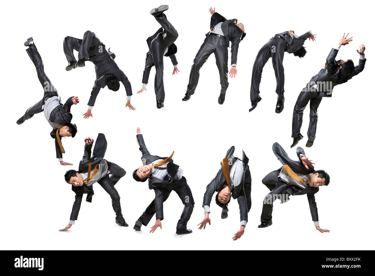 Ten businessmen flipping in the air Stock Photo - Alamy