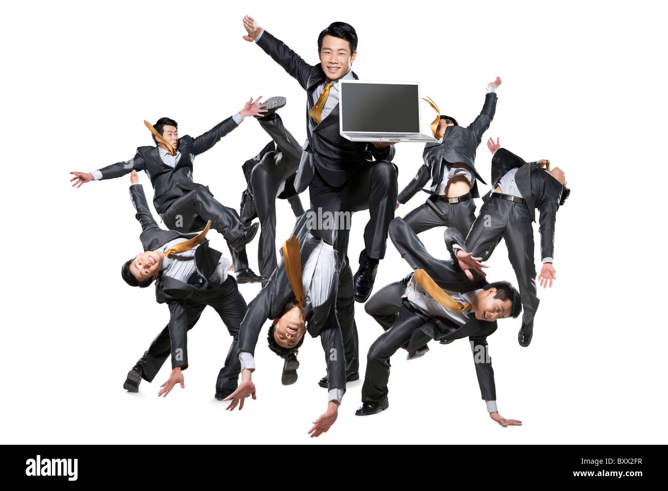 Businessmen flipping around Stock Photo - Alamy