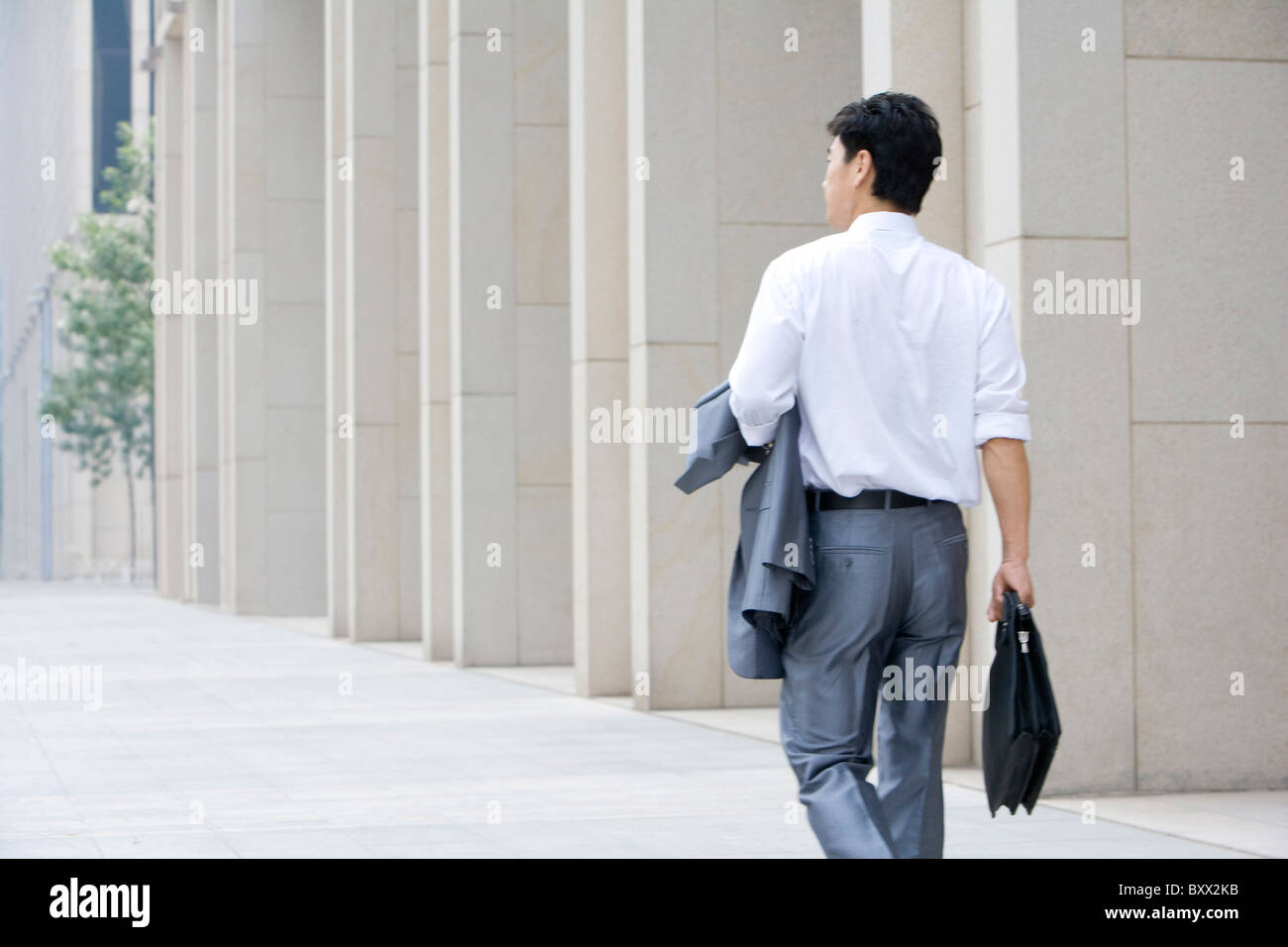 Businessman on the move Stock Photo - Alamy