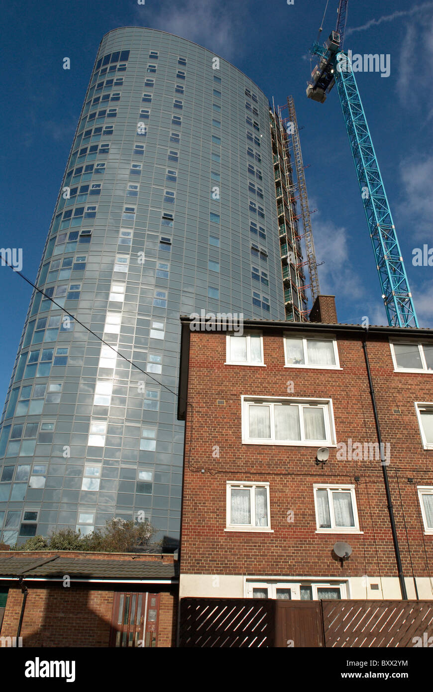 Houses near Stratford Eye building under construction East London UK ...