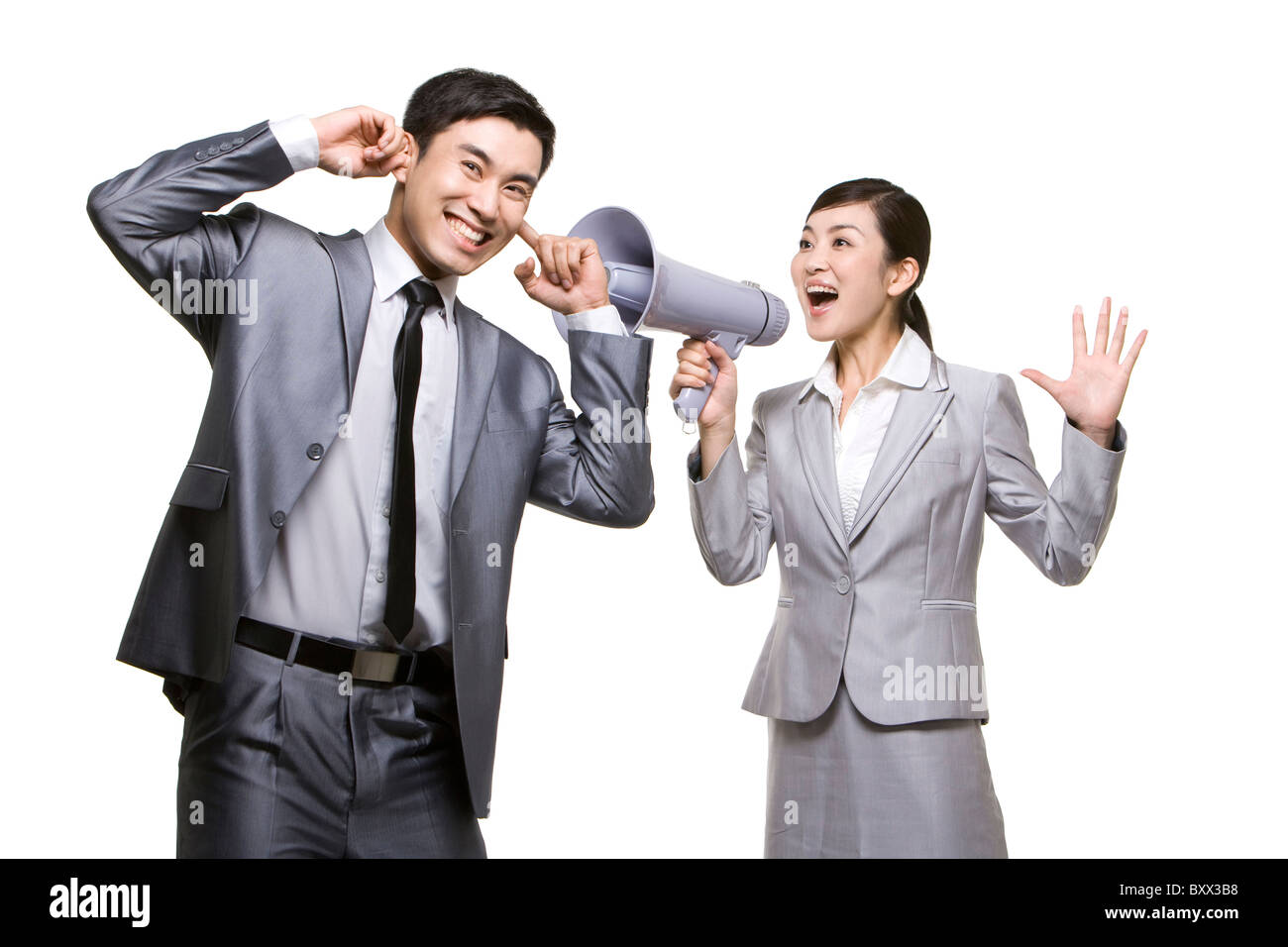 Two smiling young businesswoman talking Cut Out Stock Images & Pictures ...