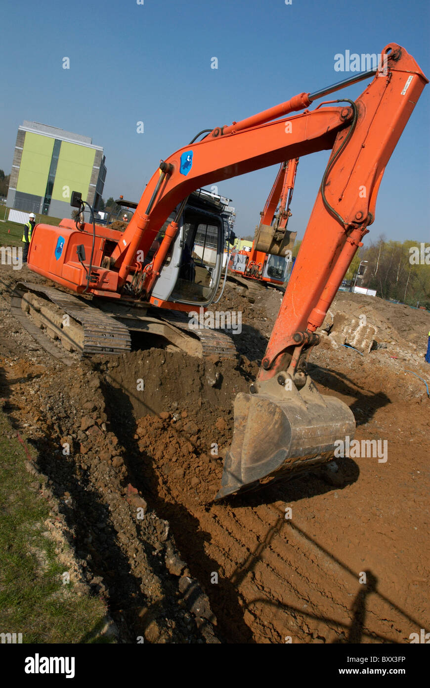 Digger on construction site UK Stock Photo - Alamy