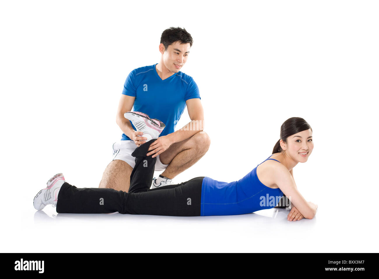 Couple touching legs Cut Out Stock Images & Pictures - Alamy