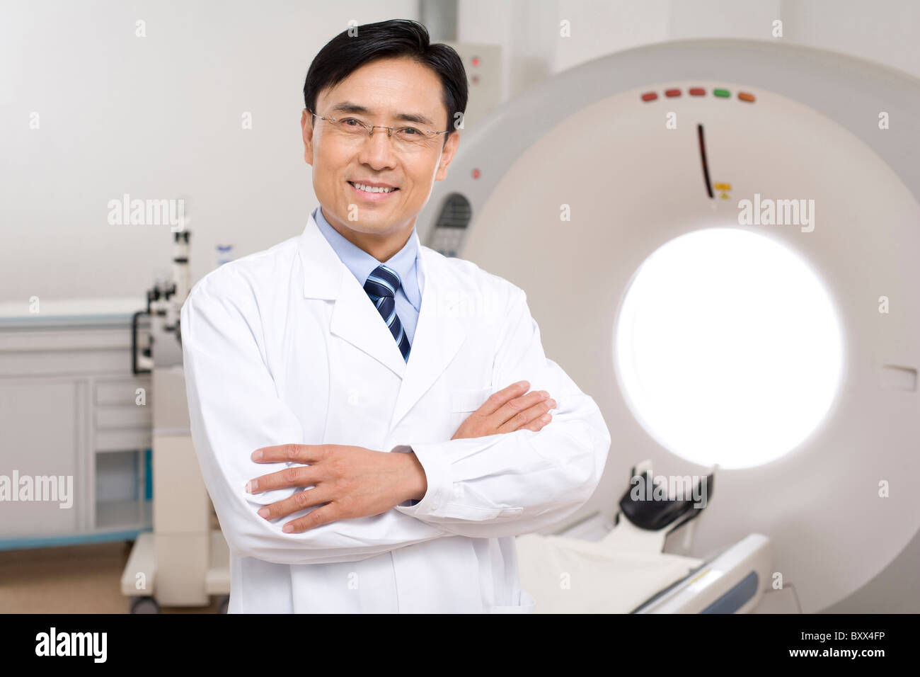 Portrait of a medical professional and a MRI scanner Stock Photo - Alamy
