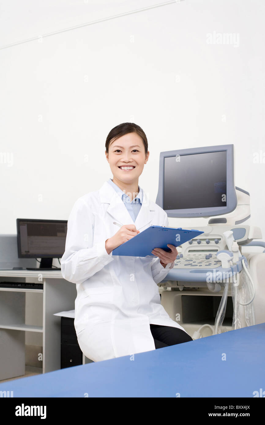 Lab technician with medical equipment Stock Photo - Alamy