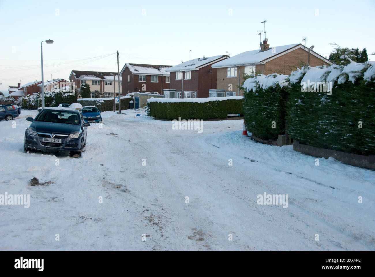 Snow covered suburban street Stock Photo - Alamy
