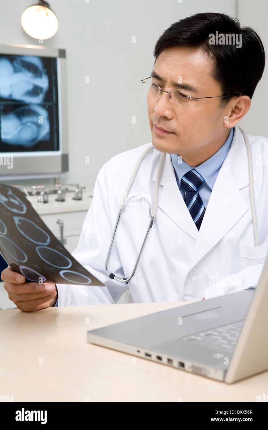 Doctor at work Stock Photo - Alamy