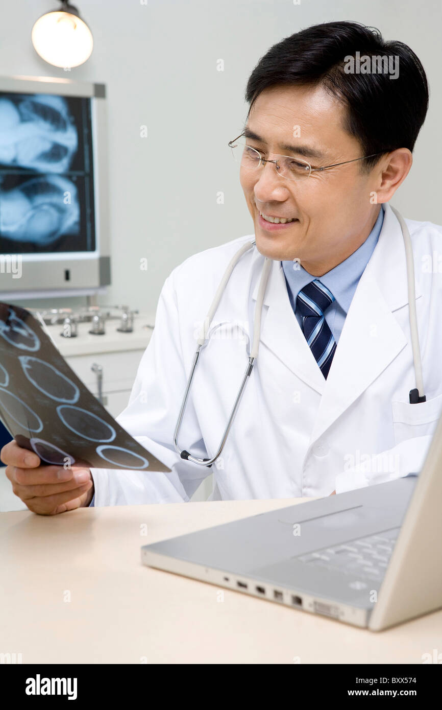 Doctor at work Stock Photo - Alamy