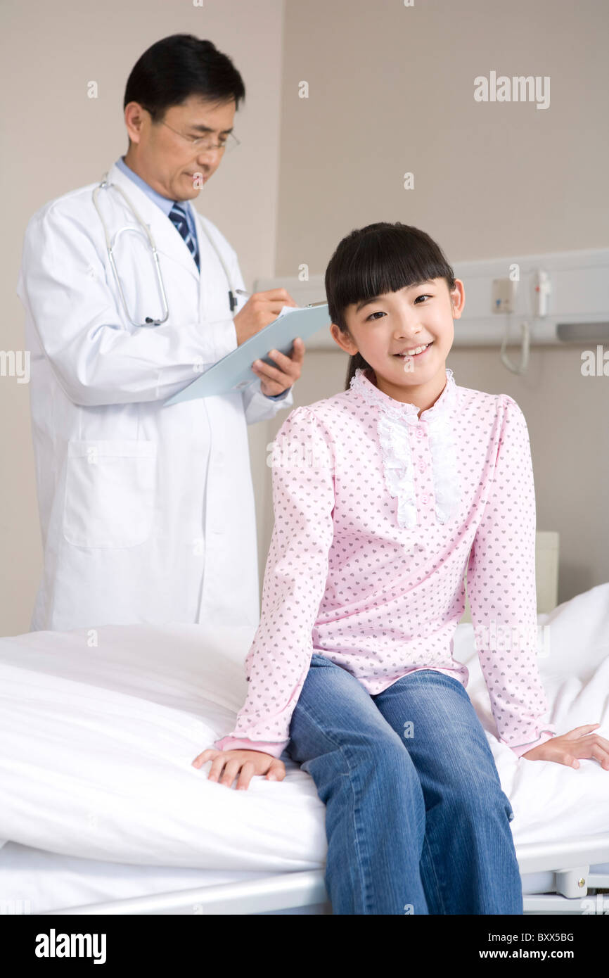 Portrait of a girl and her doctor Stock Photo - Alamy