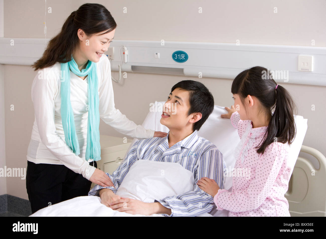 Portrait of a patient and his family Stock Photo - Alamy