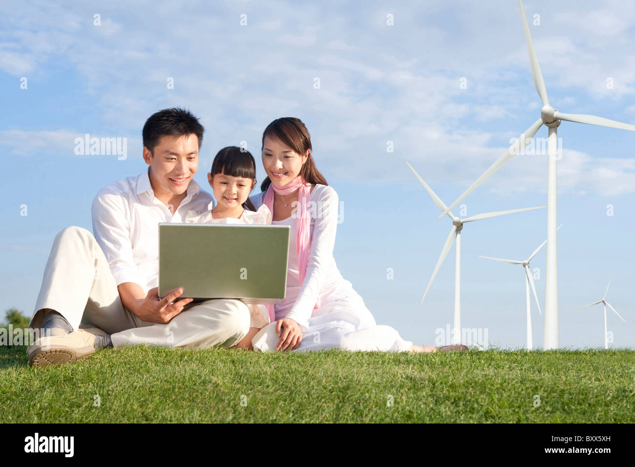 Family with windmill Stock Photo - Alamy