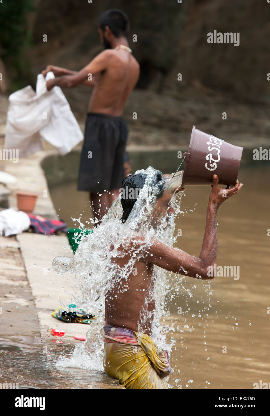 Men bathing in river Sri Lanka Stock Photo - Alamy
