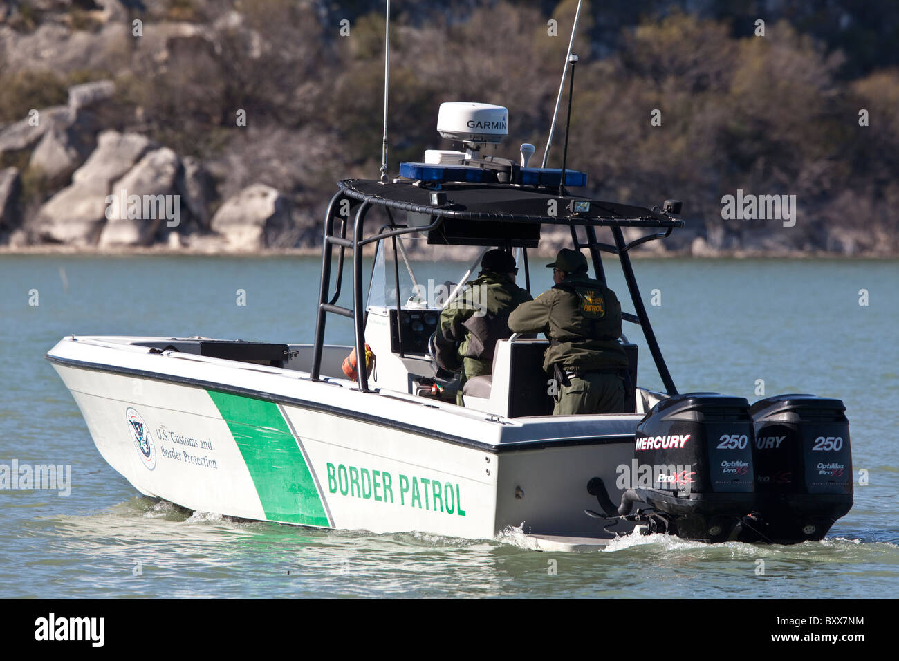 U.S. Border Patrol agents on the Rio Grande River arm of Lake Amistad ...
