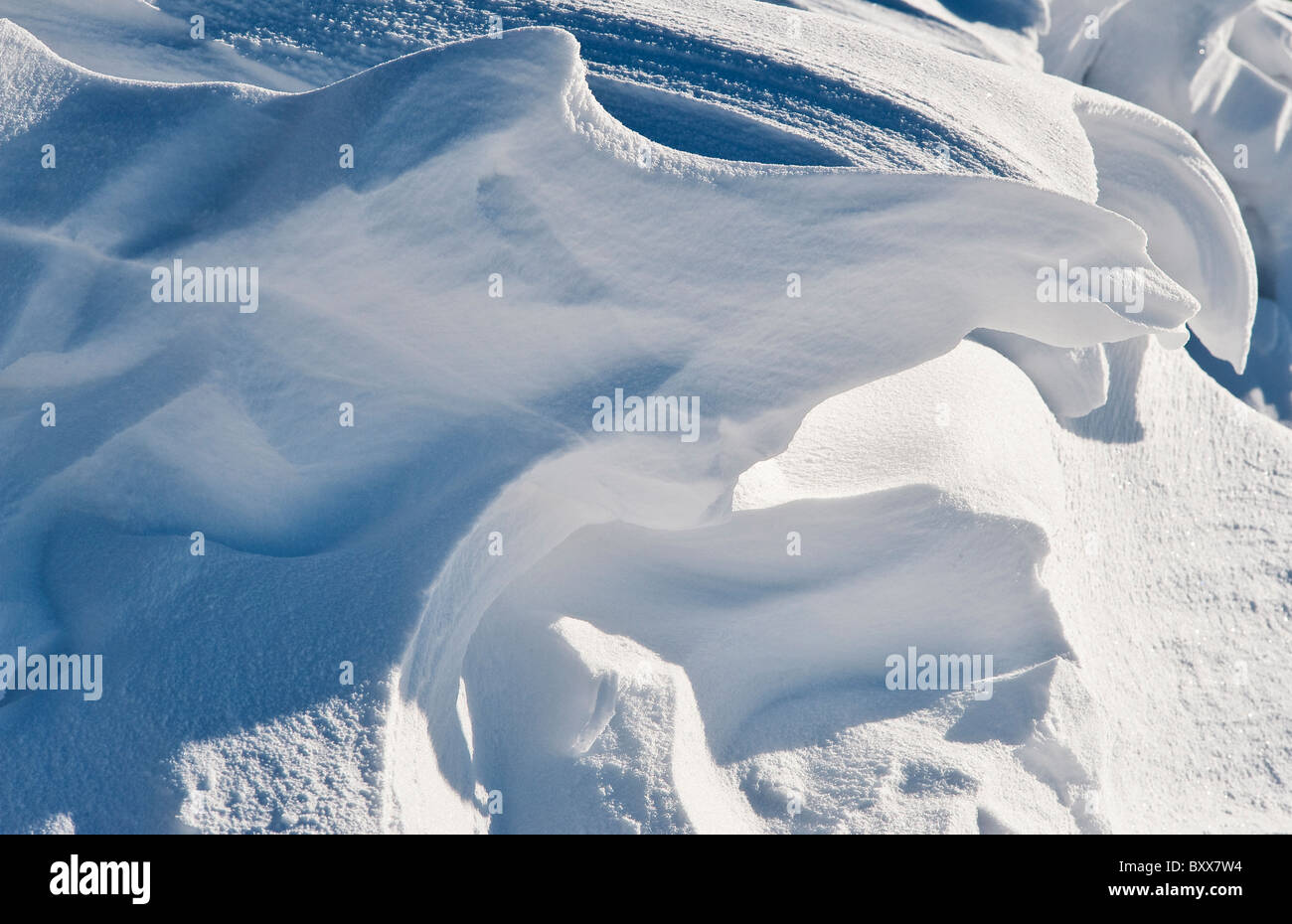 Wind-blown snow making abstract shapes - Wales, UK Stock Photo - Alamy