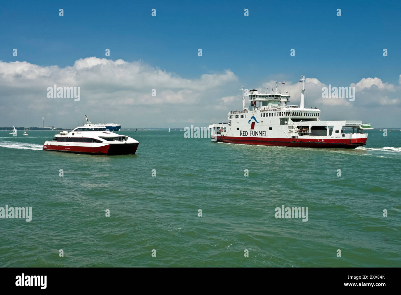 Red Funnel catamaran Red Jet 4 heads passes Red Funnel ferry Red Eagle ...