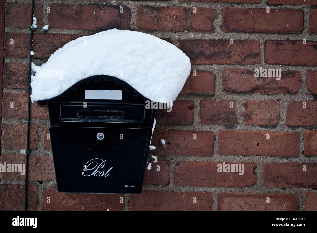 post box covered in snow Stock Photo - Alamy