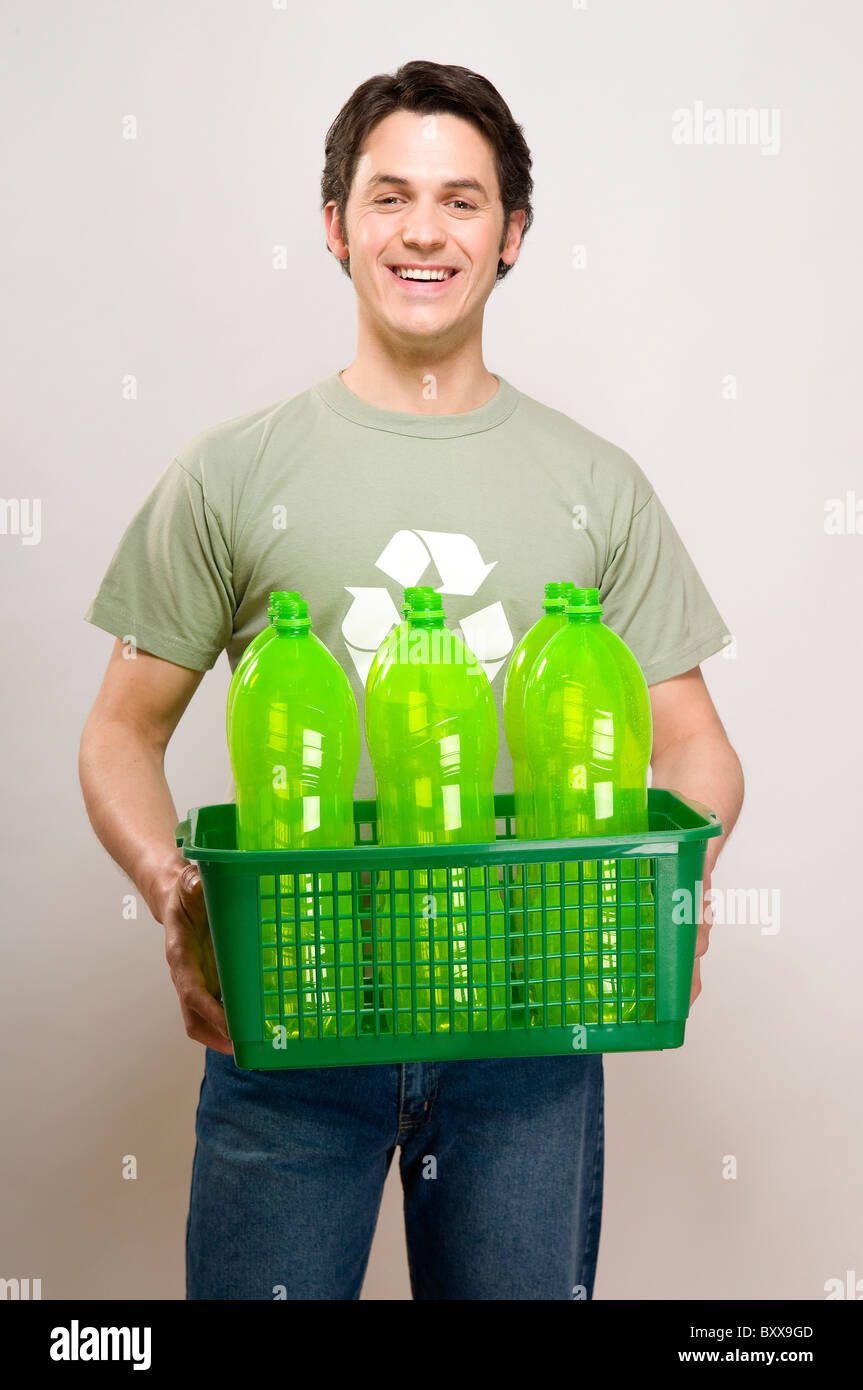 Man holding box of recycling Stock Photo - Alamy